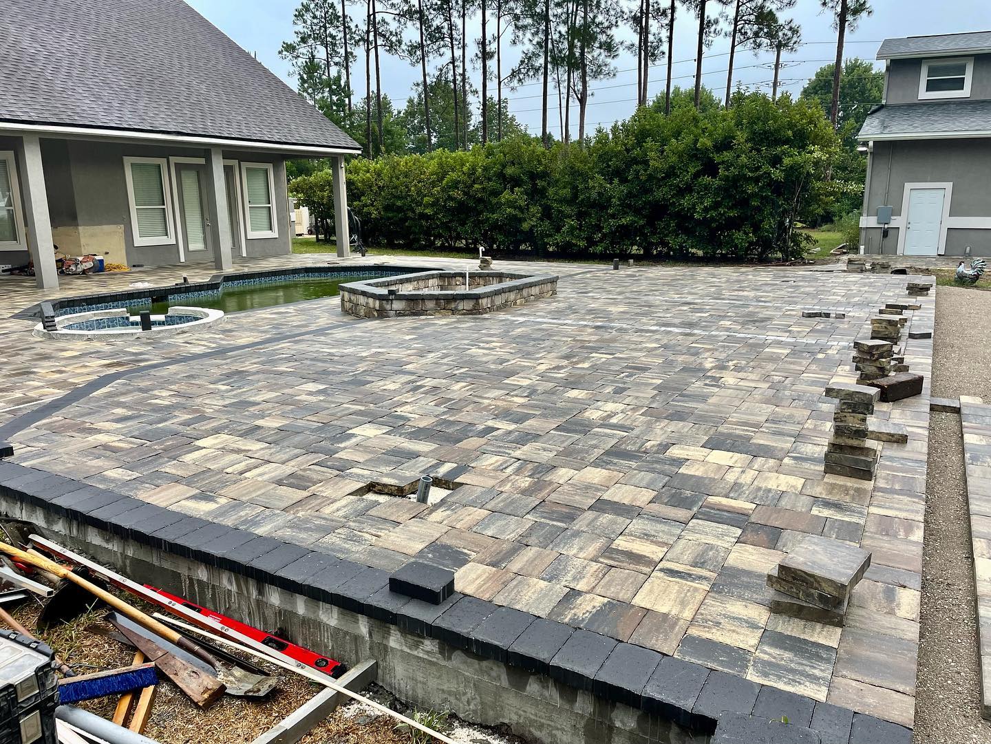 Paradise Found: A St. Augustine Pool Deck Transformation - River Stonework