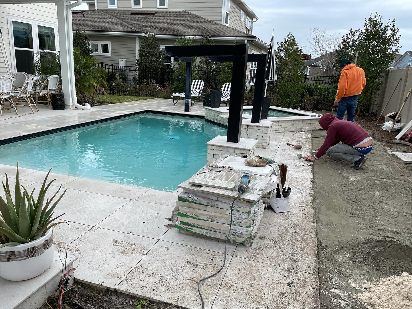 Comparing Durable Pool Deck Paver Materials for Superior Performance - River Stonework